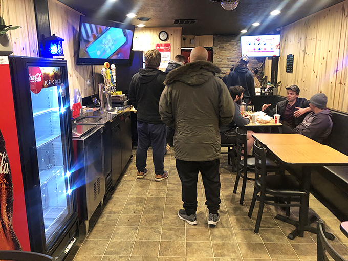 The universal language of "yum" in action. These diners are experiencing chicken nirvana, and you can too!