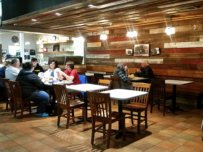 Happy diners enjoying their cheesy feasts. This scene is more heartwarming than a grilled cheese on a cold day.