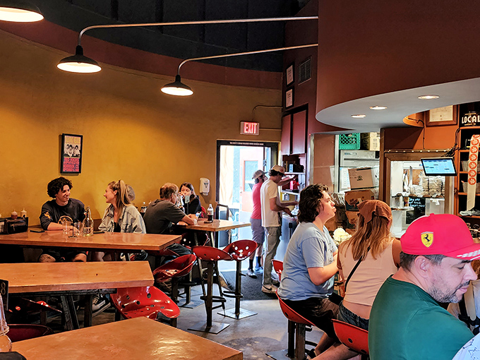 Where burger dreams come true! Happy diners dive into their meals, proving that good food brings people together like nothing else.