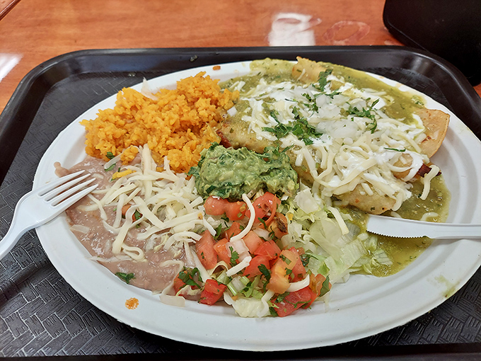 Green means go... straight for these enchiladas! Smothered in sauce and cheese, they're the comfort food hug you didn't know you needed.
