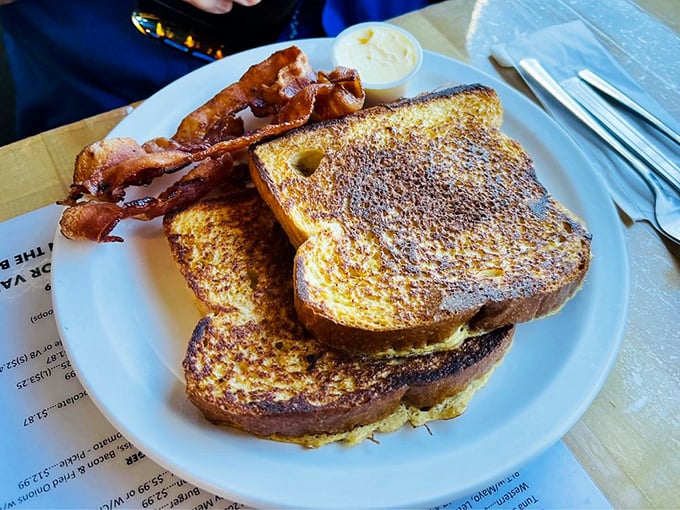 French toast that's more "ooh la la" than "oh la la." Paired with bacon so crisp, it could snap you out of any morning funk.