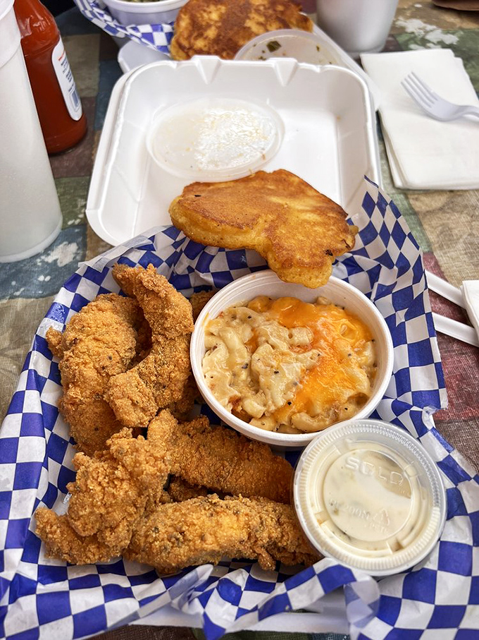"Crispy on the outside, flaky on the inside &ndash; this catfish has more layers than a Southern family drama. And that cornbread? Pure gold!"