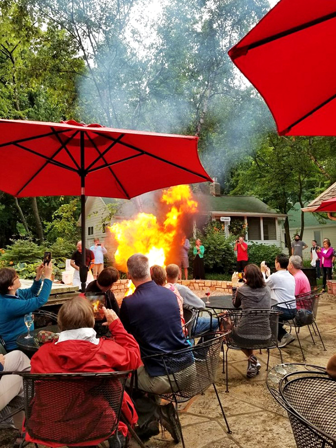 Dinner and a show: Guests gather 'round as the fish boil reaches its fiery finale&mdash;talk about playing with your food!