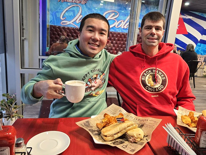 Smiles wider than the Florida Straits! These happy diners are living proof that good food equals good times.