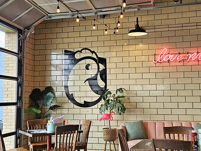 Who knew brick walls could be so charming? With string lights and quirky decor, this interior is like a hug for your eyes.