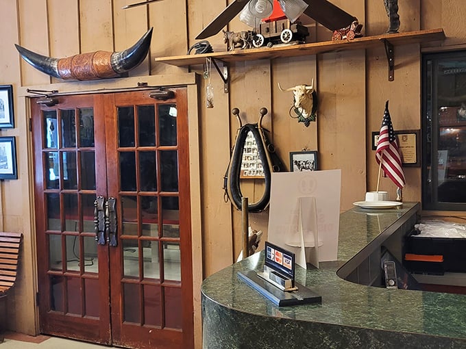 Where steakhouse meets art gallery. This reception area's got more personality than a late-night talk show host.