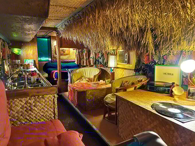 Aloha, retro paradise! This tiki-themed trailer interior is so authentic, you'll be checking the calendar to make sure you haven't accidentally traveled back to 1959.