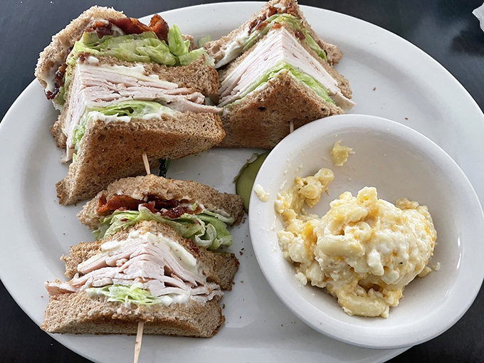 The ultimate power couple: Turkey club meets mac & cheese. It's like a delicious high school reunion on your plate.