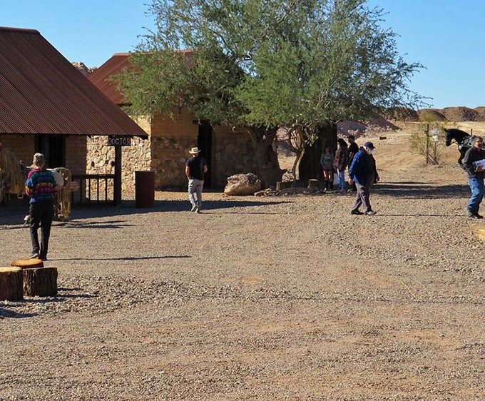 Explorers roam the dusty streets, hunting for photo ops. It's like a historical scavenger hunt, but with better lighting and fewer snakes.