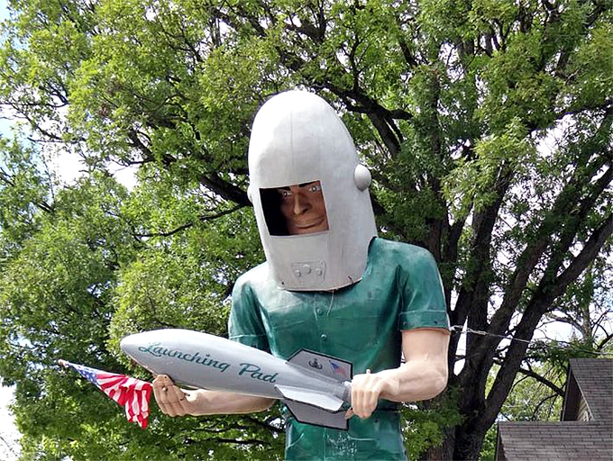 Up close, you can almost hear him whispering, "Take me to your... grill master." This gentle giant is more likely to flip burgers than flying saucers.