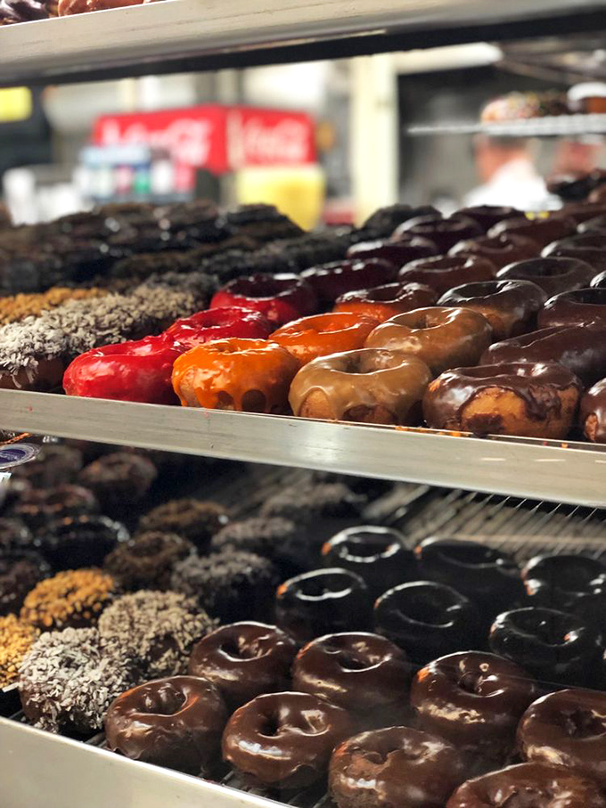 A rainbow of cake donuts that would make Homer Simpson weep with joy. Each one is like a tiny, edible work of abstract art. Sprinkles are the new paint splatter!
