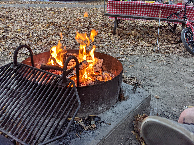 Gather 'round the campfire, where stories get taller and marshmallows get toastier. It's like a cozy living room, but with more stars and less WiFi.