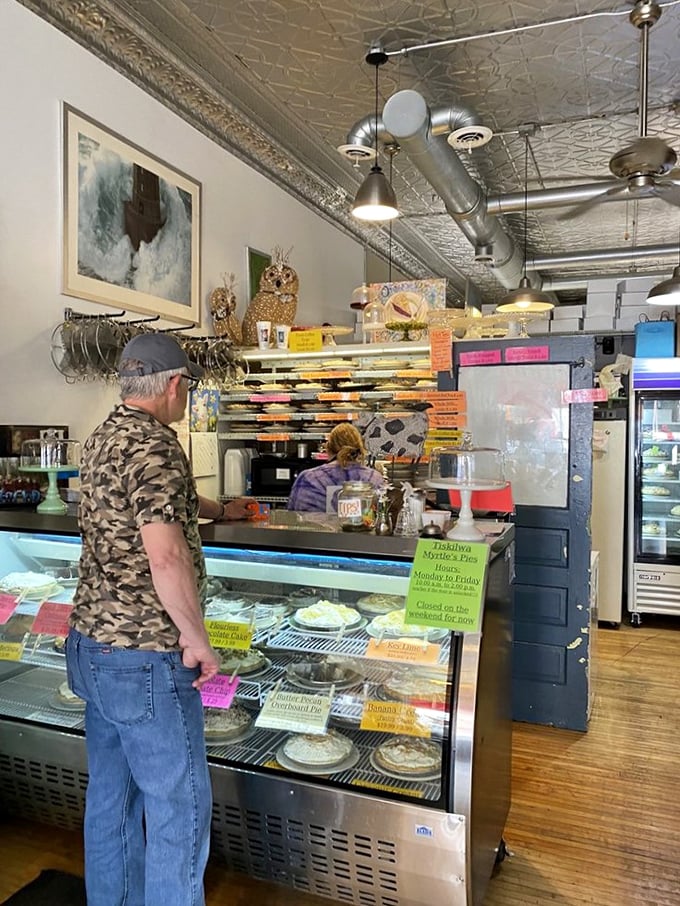 Decisions, decisions! This pie case is like a treasure chest of flavors, each one vying for your undivided attention.