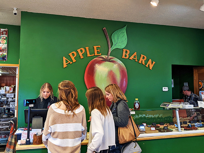 Apple fever is contagious! These eager customers know that patience is a virtue when pie perfection is on the line.