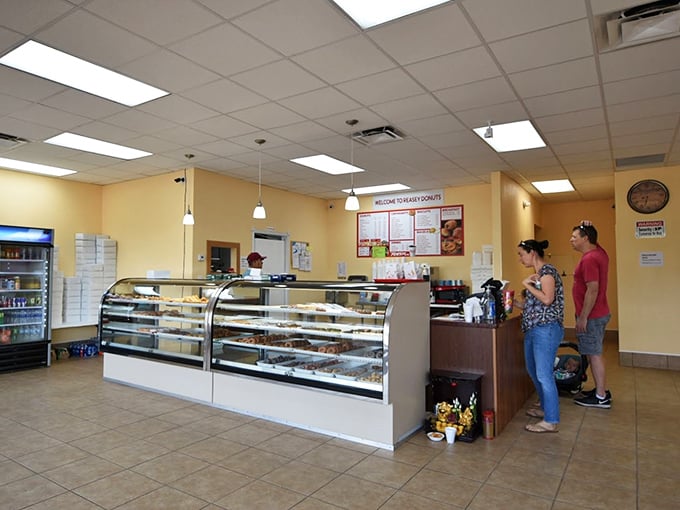 Early bird gets the donut! These eager customers know that at Reasey's, the early morning queue is worth every minute of lost sleep.