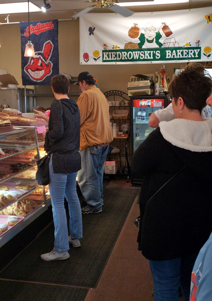 The line forms here for happiness! These eager customers know that good things come to those who wait (in bakery lines).