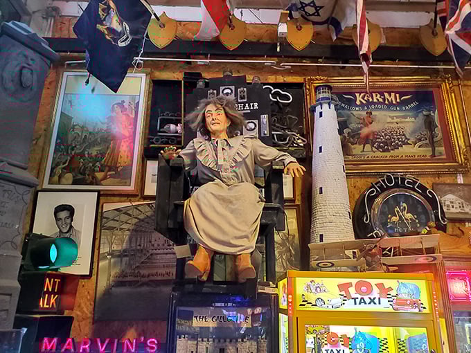 Airplane overhead? Check. Vintage signs everywhere? Check. Feeling like you've stumbled into a mad collector's attic? Double-check. Welcome to organized chaos, folks!