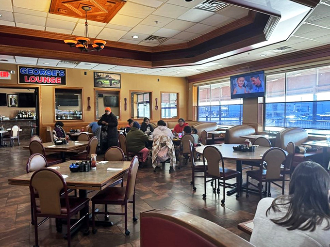 The breakfast club in session! At George's, every table tells a story, and every story involves bacon.