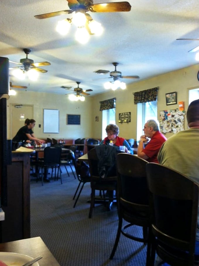 A slice of local life! This dining room is where stories are shared, friendships are forged, and pancakes disappear faster than you can say "syrup."