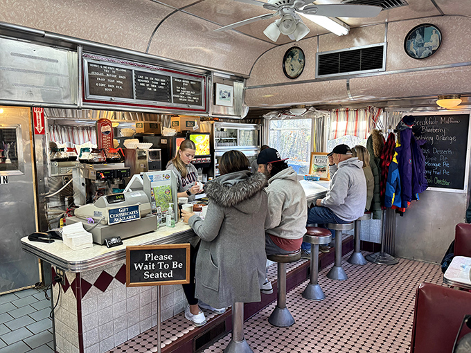 Where strangers become friends over steaming plates. This counter scene is pure Norman Rockwell meets "Cheers."