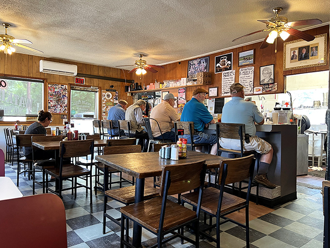 The breakfast club in session. These regulars have probably solved all the world's problems over countless cups of coffee and plates of eggs.