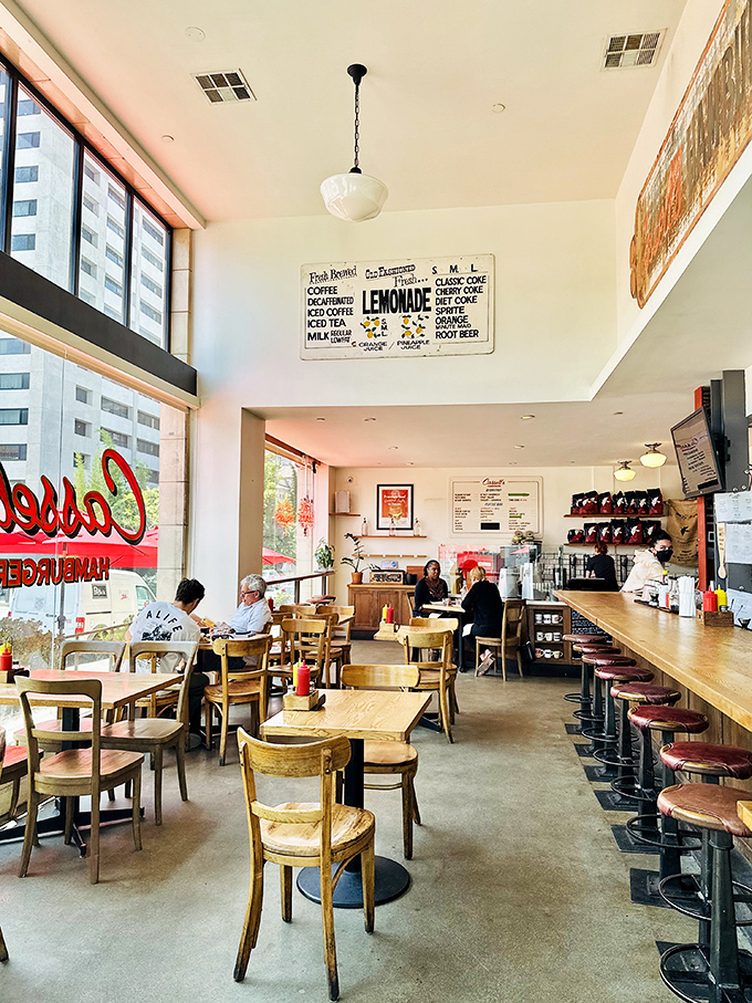 Happy diners, happy times! At Cassell's, every bite is accompanied by the sweet sound of satisfaction and the occasional "mmm" of burger bliss.