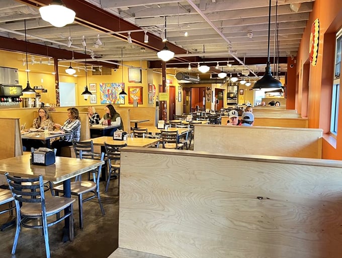 Happy diners, full plates, and a buzz of excitement. This scene is proof that at Rocky's, strangers are just friends who haven't shared a chicken wing yet.