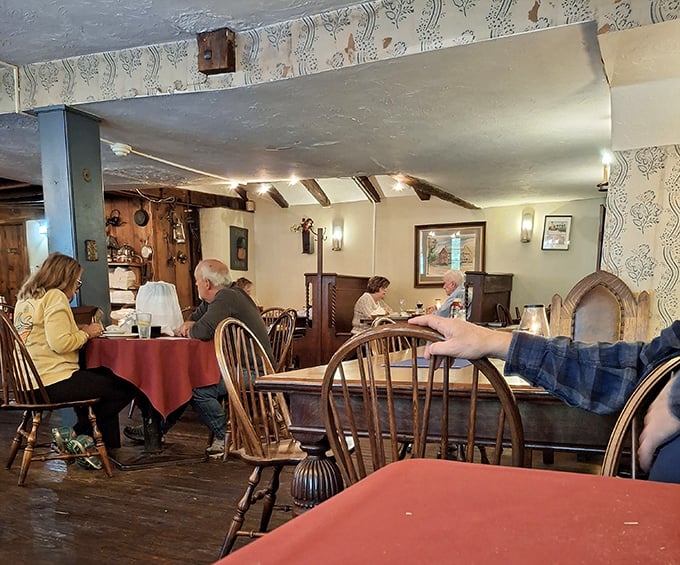 A scene straight out of a classic New England postcard. Tavern on Main: where strangers become friends over good food and better conversation.