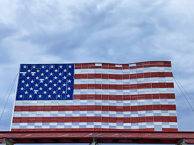 Stars, stripes, and... squares? This patriotic puzzle piece is waving hello to all who enter Awakon Park.