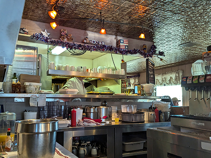Behind the scenes of breakfast bliss. This kitchen is like a well-oiled machine, if that machine ran on butter and bacon grease.
