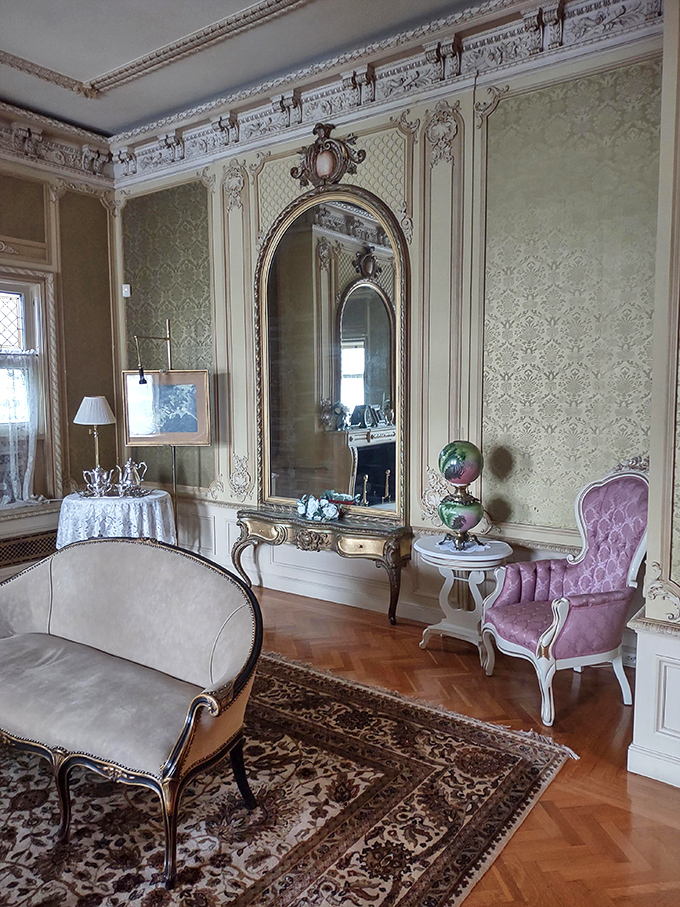 Mirror, mirror, on the wall, who's the fanciest room of all? This parlor's giving Snow White's digs a run for their money.