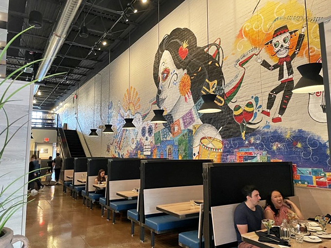 Who needs a museum when you've got this mural? It's like Frida Kahlo and Diego Rivera threw a fiesta on the wall!