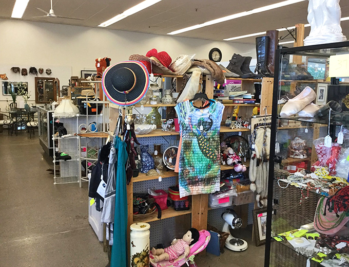 Books, baubles, and bric-a-brac, oh my! This shelf is a microcosm of the flea market experience &ndash; eclectic and endlessly fascinating.