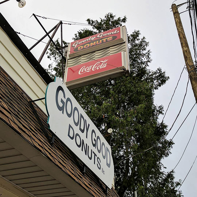 The bat-signal for donut lovers! This retro sign promises a super-powered sugar rush to all who answer its call.