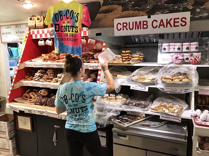 Behind the scenes of sweetness! The staff at Ob-Co's are like donut wizards, conjuring up magic in every batch.
