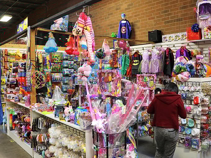 Toy story come to life! This booth is bursting with enough colorful playthings to make Santa's workshop jealous.