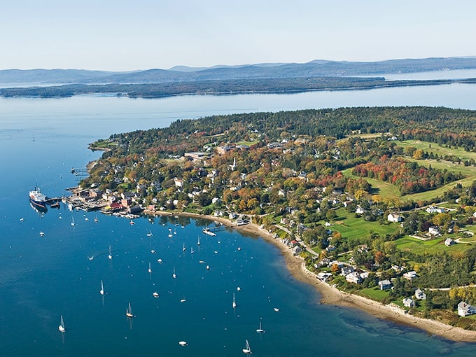 Castine's waterfront: Where history meets the sea. Sailboats and centuries-old buildings create a timeless maritime tableau.