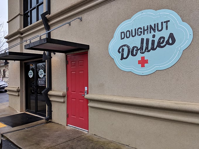Doughnut Dollies: Where sweetness meets style! This chic exterior hints at the gourmet delights waiting inside.