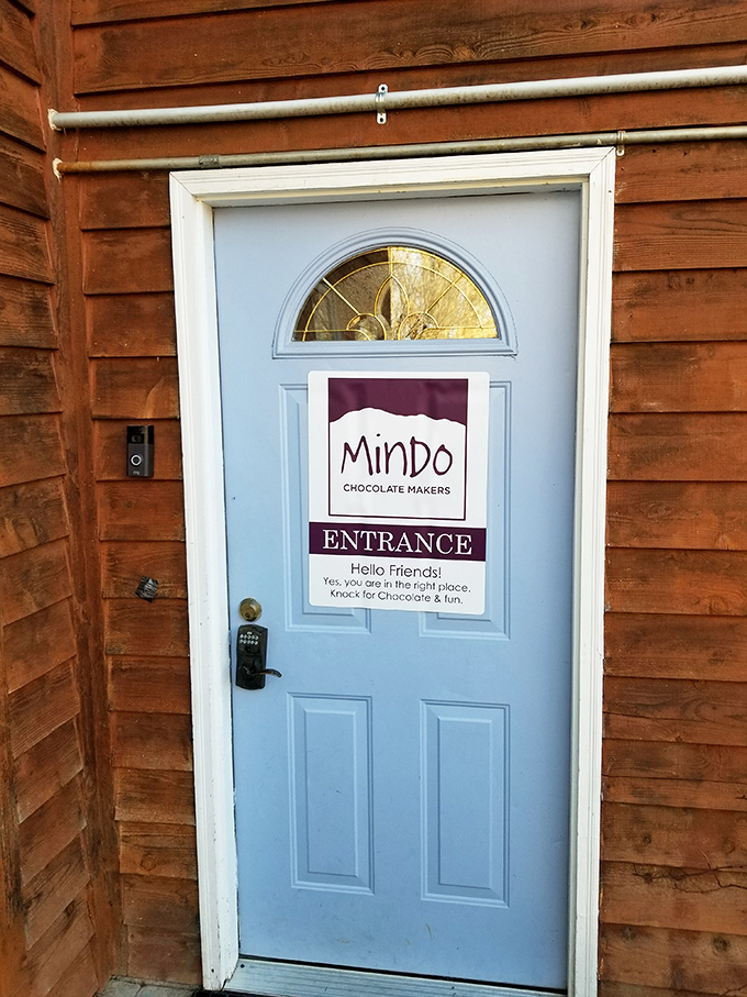 Behind this unassuming door lies a world of chocolate wonder. It's like finding Narnia in your closet, but tastier!
