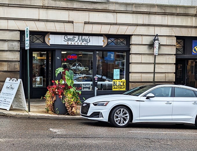 Chic black awning, irresistible treats within. Sweet Mary's: where "I'll just have one" becomes the biggest lie you'll tell yourself today.