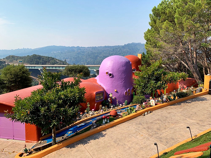 Bedrock goes Technicolor! This bulbous beauty proves that sometimes, the most eye-catching homes are the ones that break all the rules.