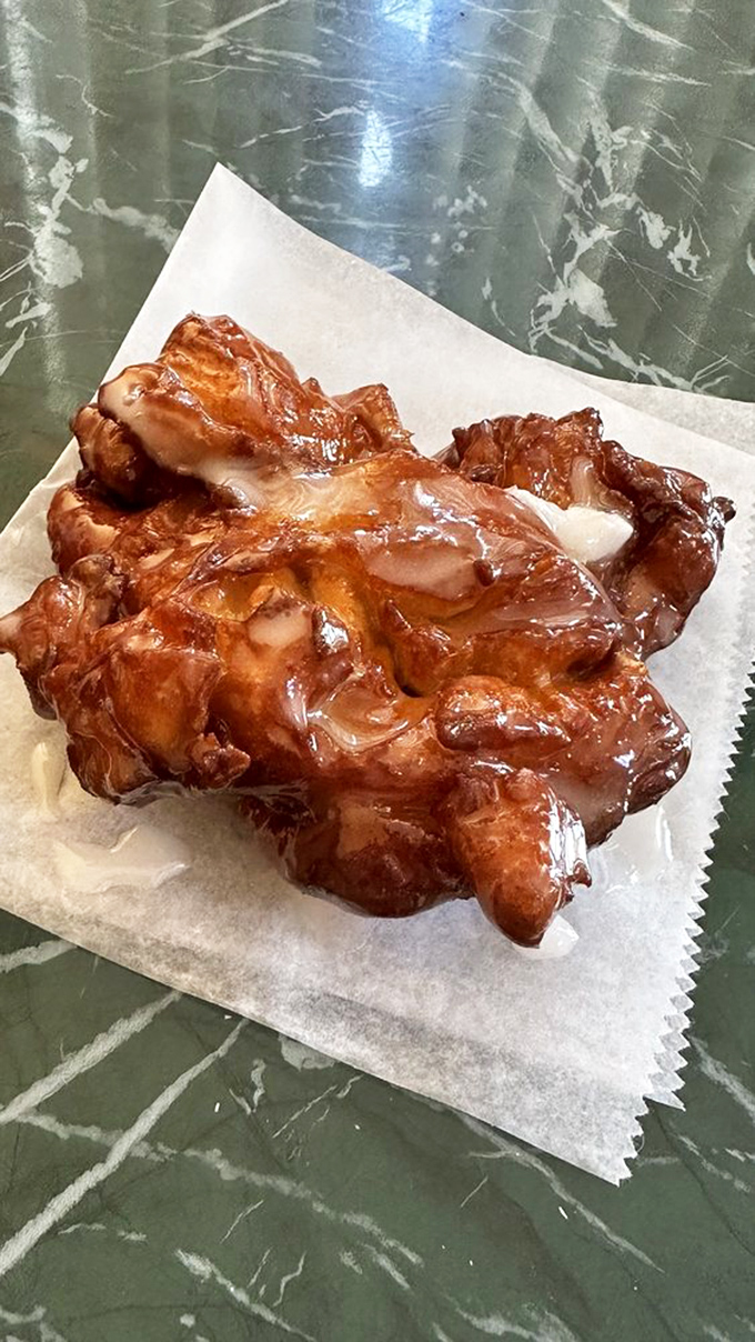 Holy fritter, Batman! This apple fritter is not just a donut, it's a work of art – a delicious, crispy, gooey work of art.