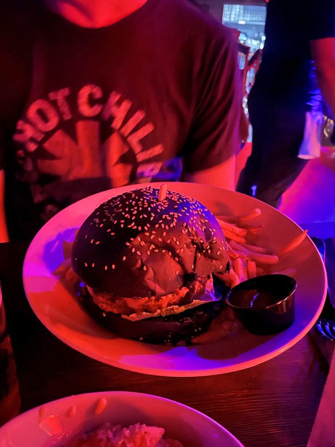 Darth Vader called, he wants his bun back! This black burger is a force to be reckoned with, proving that the dark side has never tasted so good.