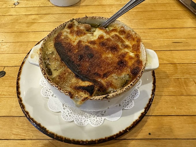 French onion soup that's cheesier than a dad joke and more comforting than a warm hug.