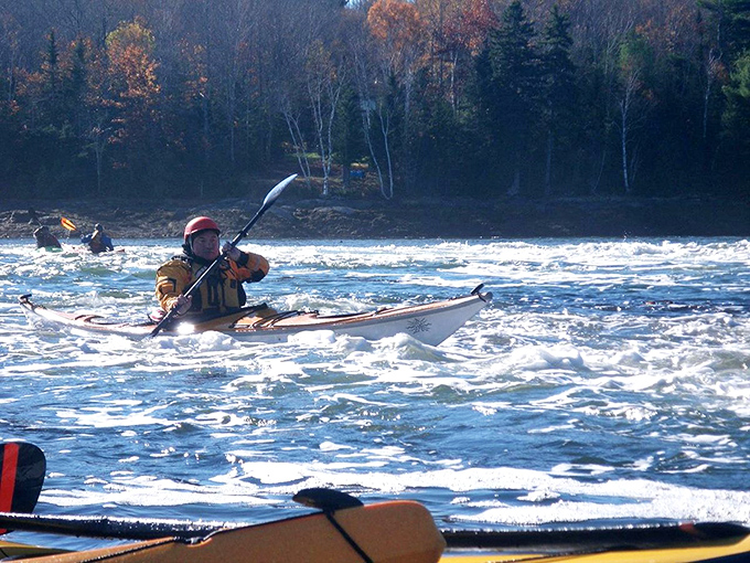 Ride the wild waters! These intrepid kayakers prove that in Maine, adventure is always just a paddle away.