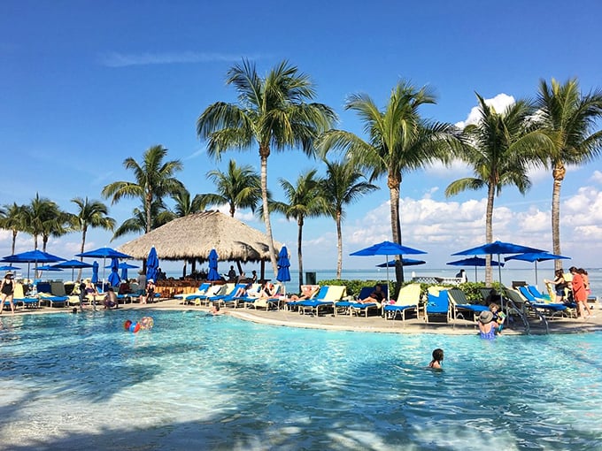 Pool party, island style! Where the hardest decision is choosing between a refreshing dip or lounging with a tropical drink. Why not both?