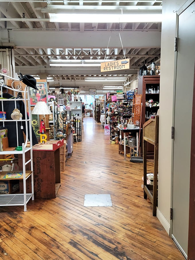 Down the rabbit hole of retro! This spacious aisle is like Alice's Wonderland, if the Mad Hatter were a passionate antique collector.