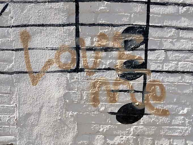 Even graffiti artists can't resist joining the band. This spray-painted addition proves music truly is a universal language.