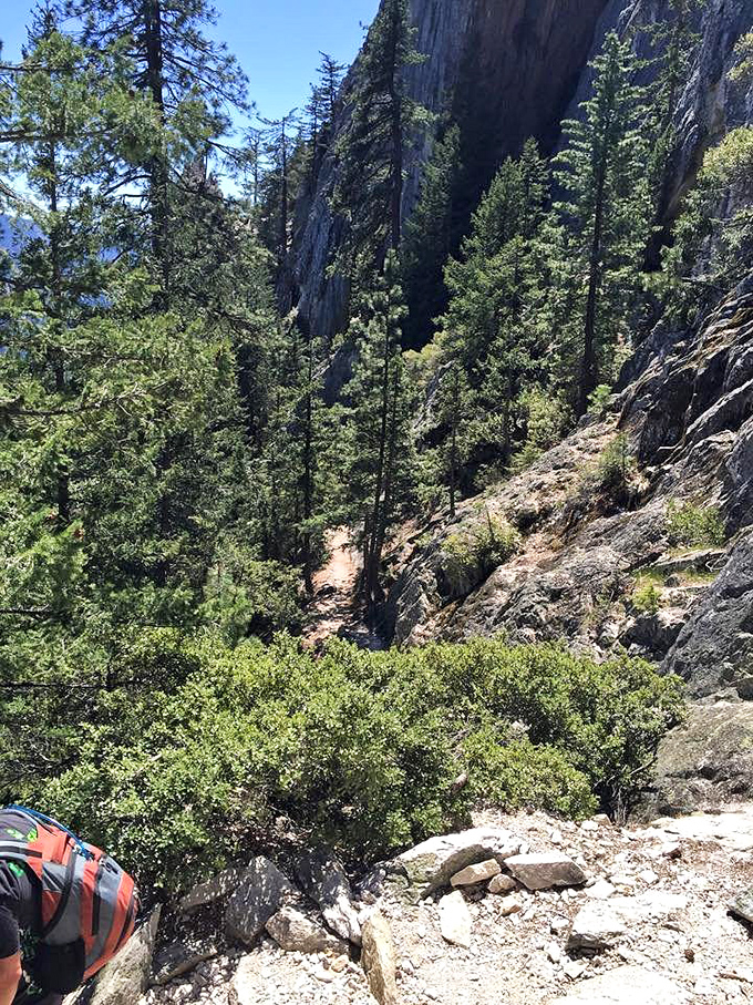 The trail beckons, winding its way through sun-dappled rocks. It's like nature's own stairmaster, but with way better views.