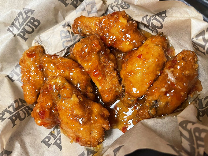 Wings so good, they'll make you forget you came for pizza! These sweet chili-glazed beauties are like flavor fireworks for your mouth.